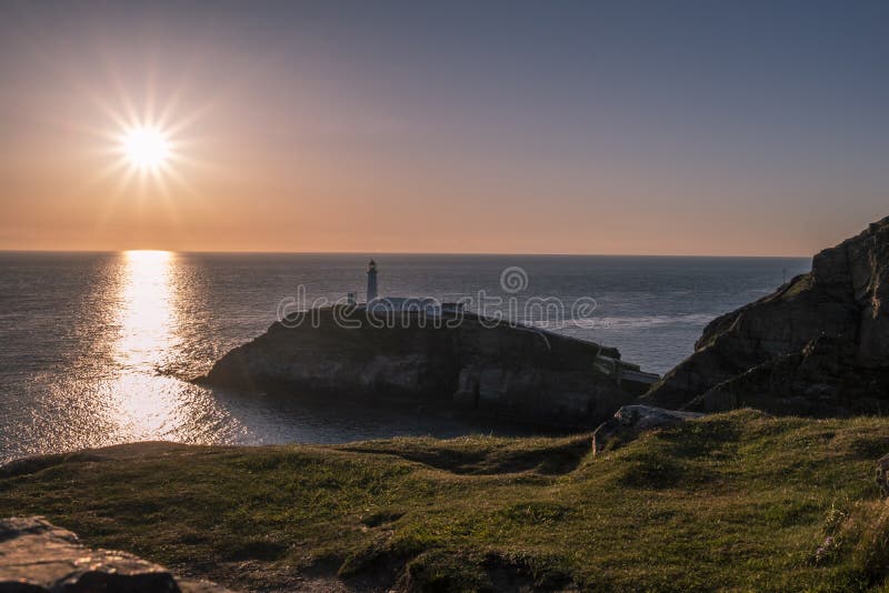 Sunset at South Stack Lighthouse on Anglesey in Wales Stock Image ...