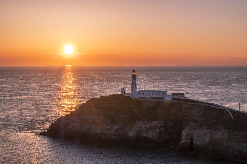 Sunset at South Stack Lighthouse on Anglesey in Wales Stock Image ...