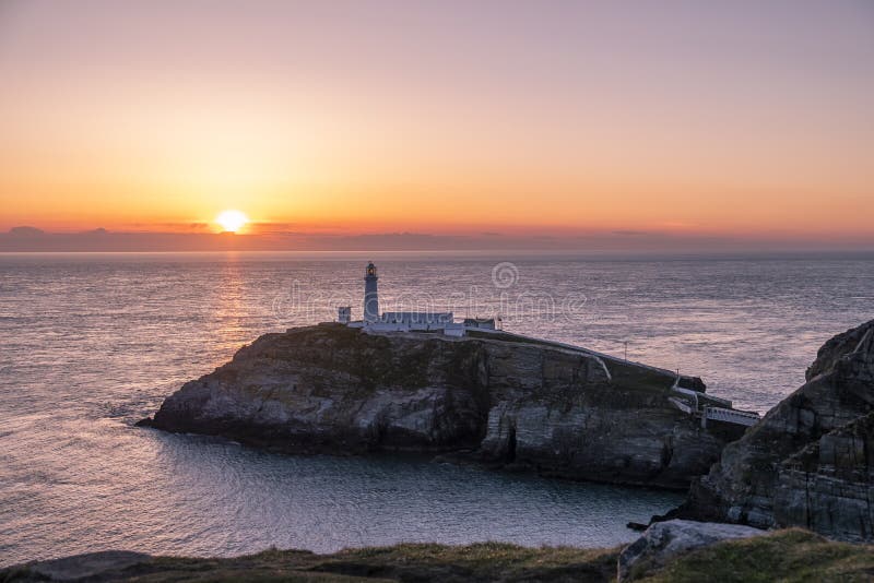 Sunset at South Stack Lighthouse on Anglesey in Wales Stock Photo ...