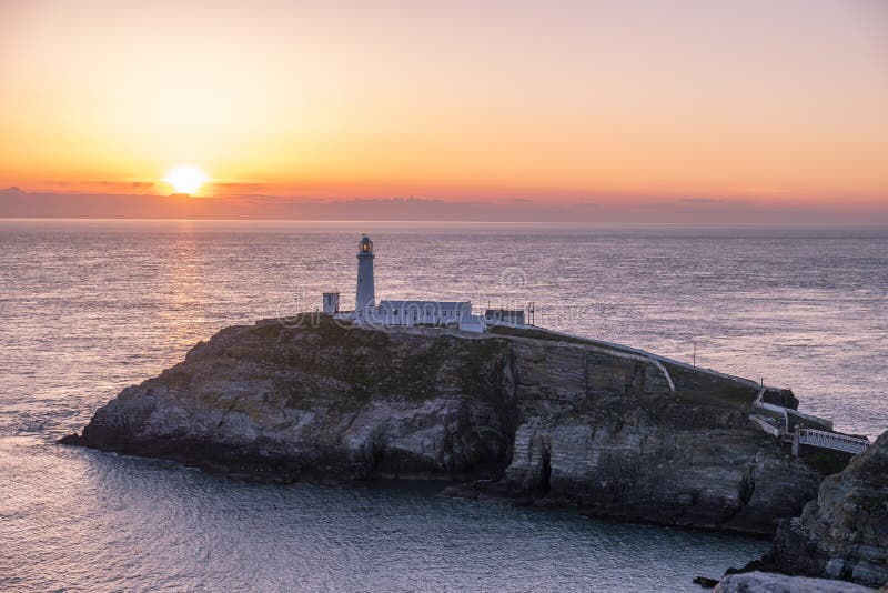 Sunset at South Stack Lighthouse on Anglesey in Wales Stock Photo ...