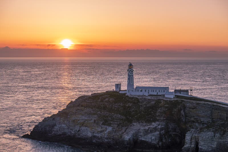 Sunset at South Stack Lighthouse on Anglesey in Wales Stock Photo ...