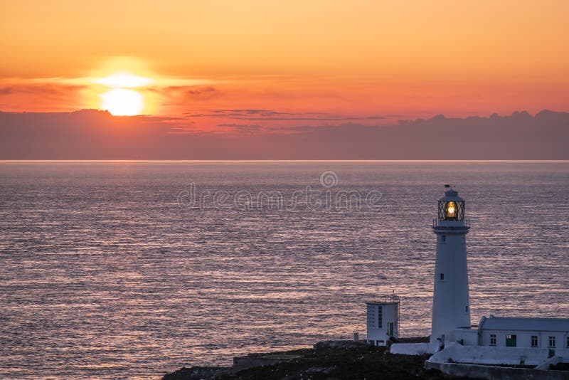 Sunset at South Stack Lighthouse on Anglesey in Wales Stock Image ...