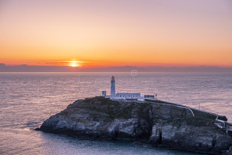 Sunset at South Stack Lighthouse on Anglesey in Wales Stock Image ...