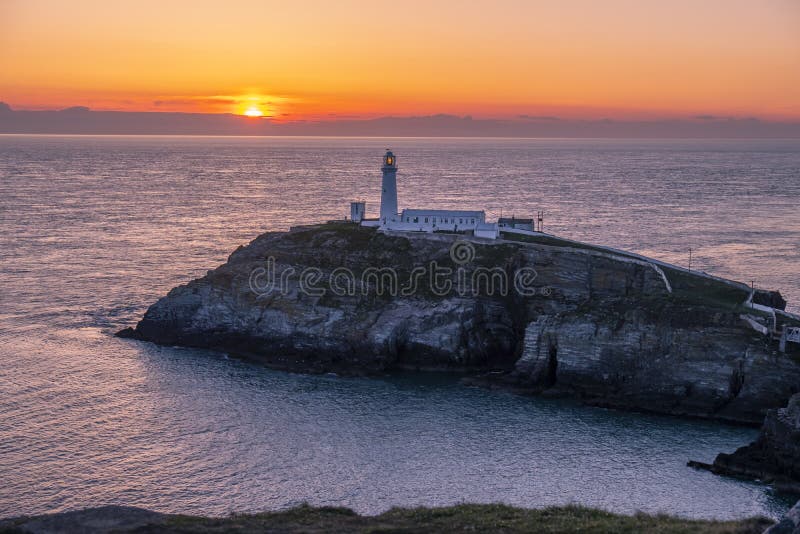 Sunset at South Stack Lighthouse on Anglesey in Wales Stock Image ...