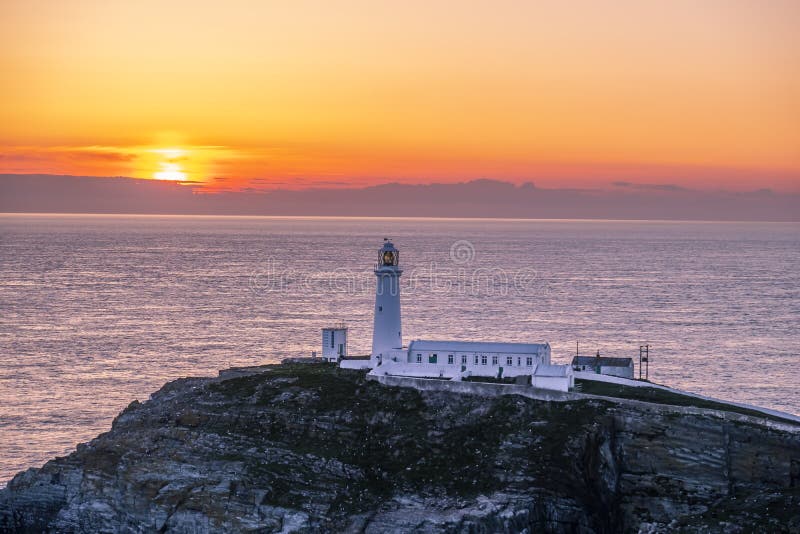 Sunset at South Stack Lighthouse on Anglesey in Wales Stock Photo ...