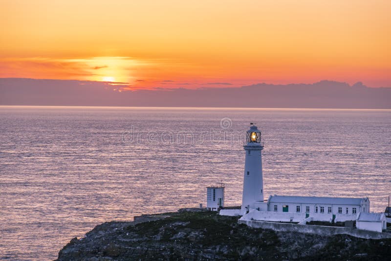 Sunset at South Stack Lighthouse on Anglesey in Wales Stock Photo ...