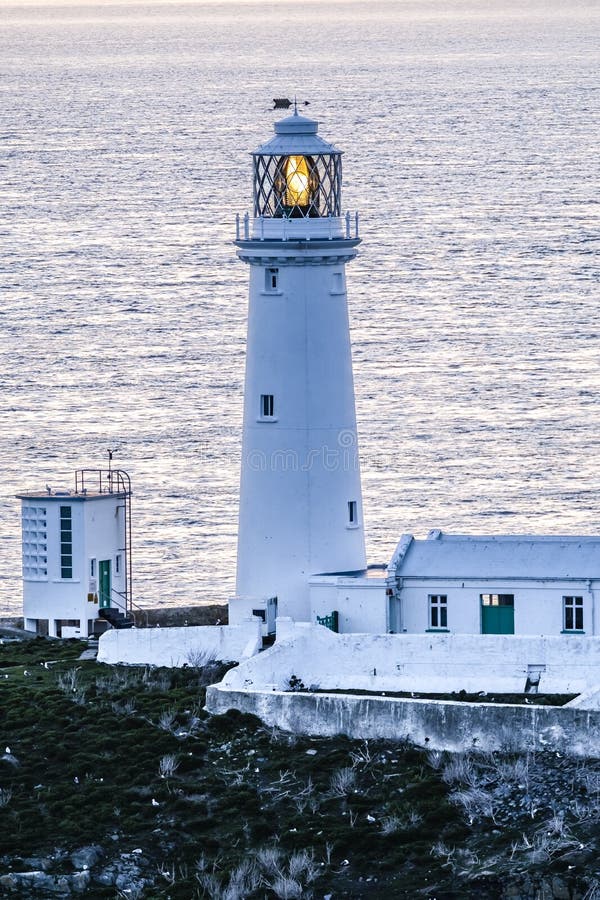 Sunset at South Stack Lighthouse on Anglesey in Wales Stock Image ...