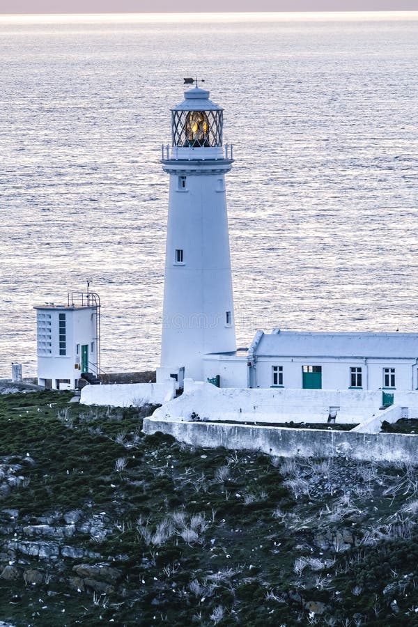 Sunset at South Stack Lighthouse on Anglesey in Wales Stock Image ...