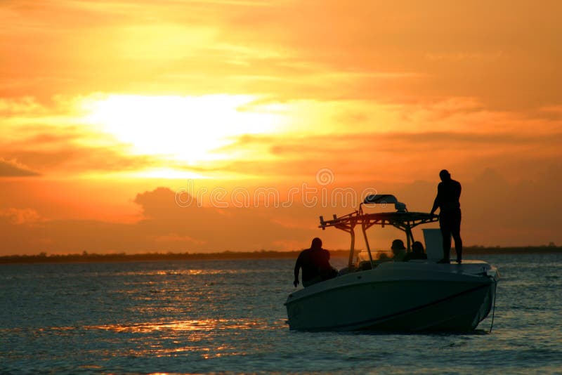 Sunset Speedboat stock photo. Image of peaceful, golden - 240224