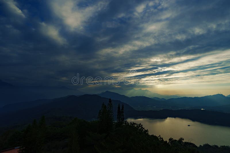 The Sunset Spray the Light through the Clouds Stock Image - Image of ...