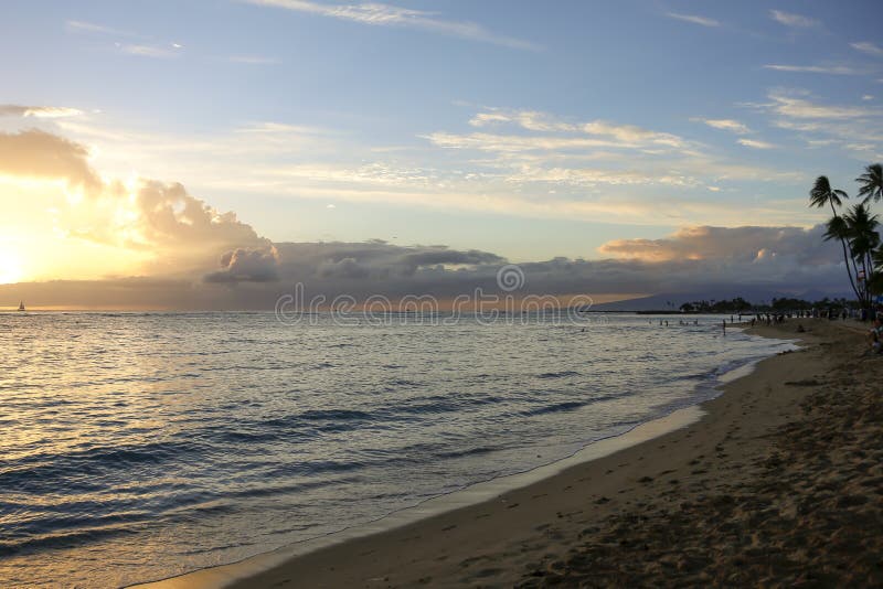Sunset Standing on a Sandy Beach with Bright Low Sun in the Horizon ...