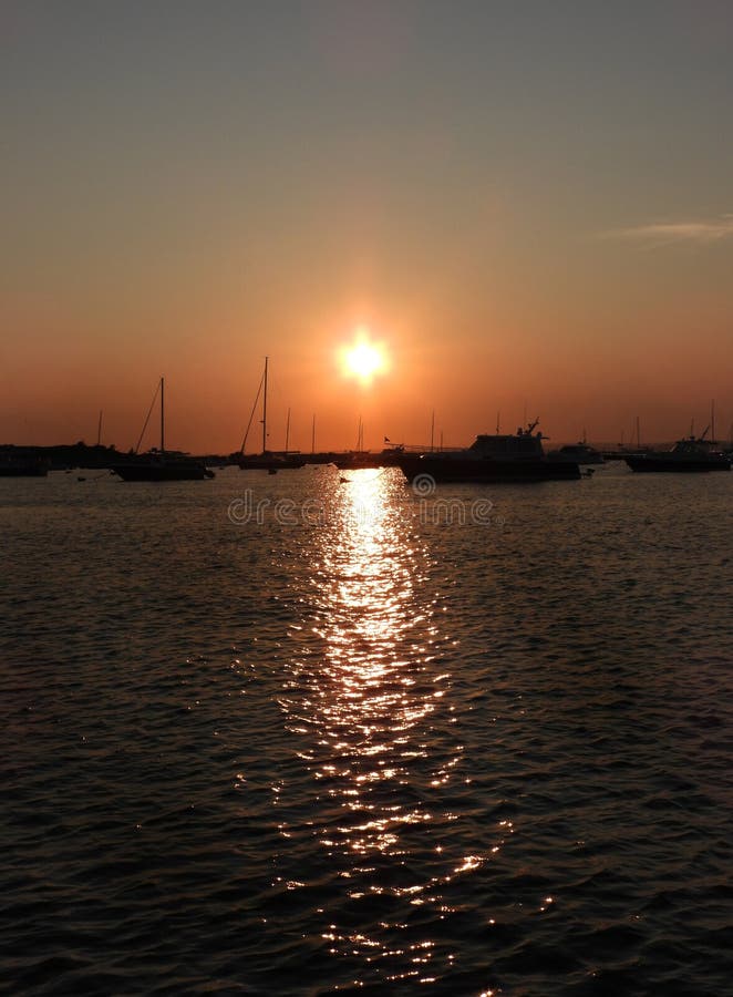 Orange Evening Sunset Begins on Watch Hill Marina in Rhode Island Stock ...