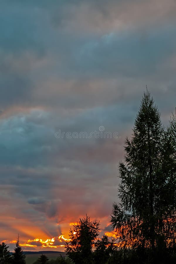 Sunset after storm stock photo. Image of rays, cloudy - 344106016