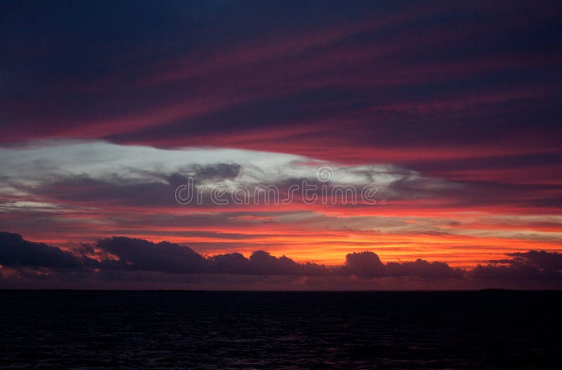Sunset after a Storm in Tonga Stock Photo - Image of water, sunshine ...