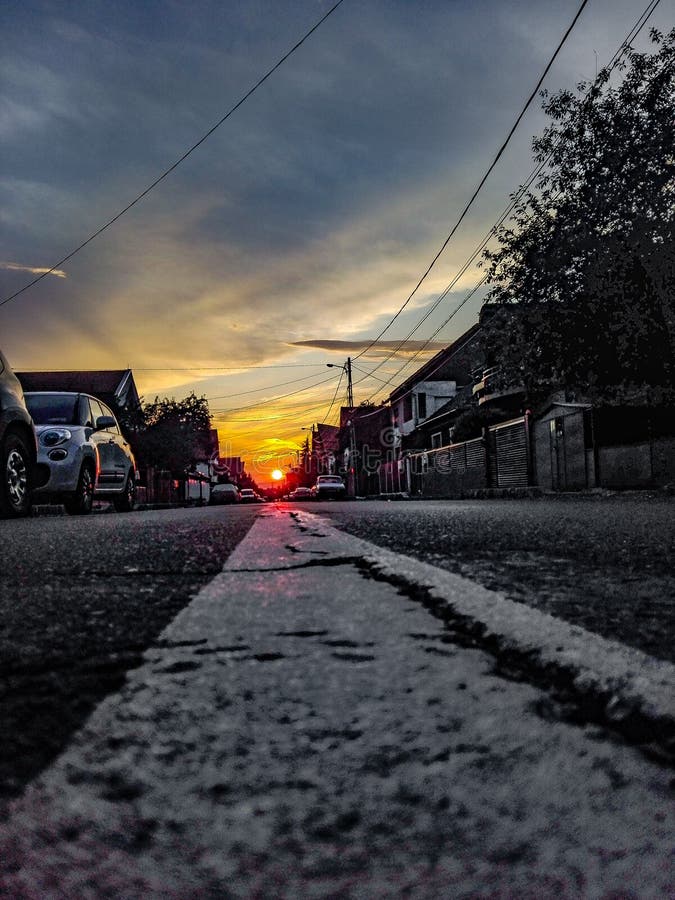Sunset on street stock image. Image of sundown, sunset - 179597161