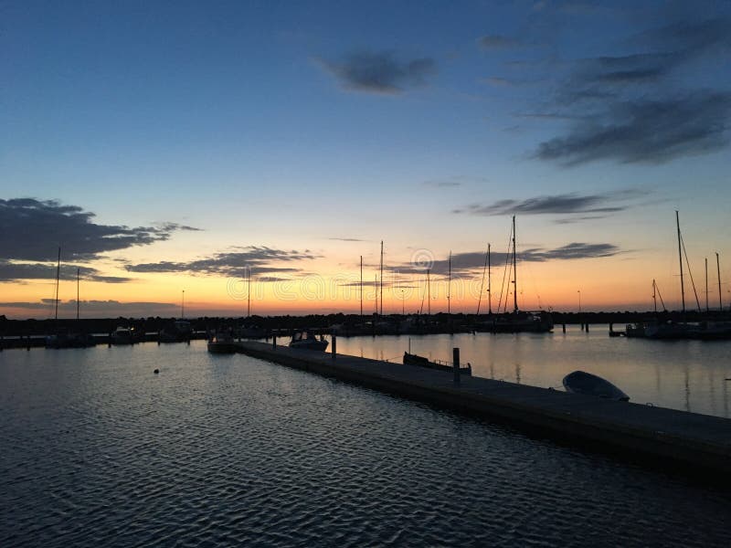 Sunset stock photo. Image of water, summer, sunset, harbour - 95854390
