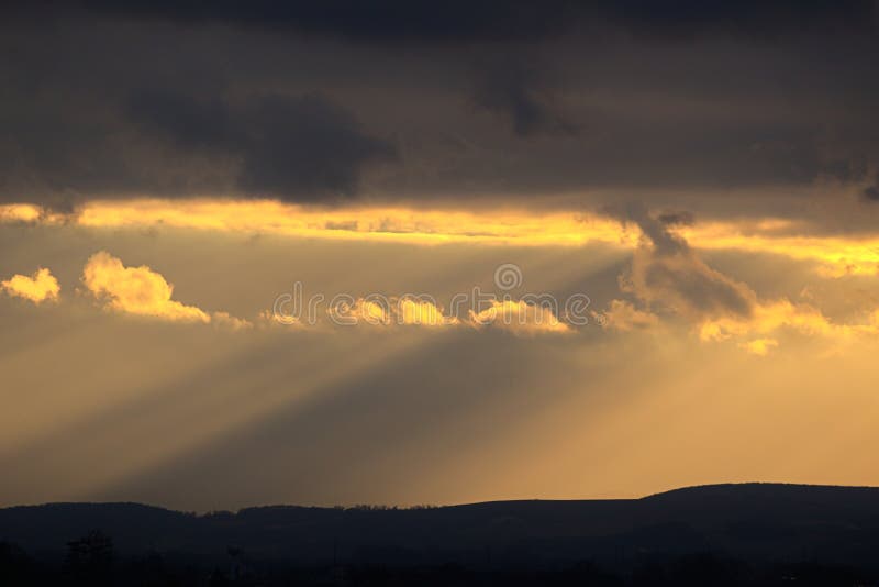 Sunset with Sun Rays Over the Hills Stock Photo - Image of mountain ...