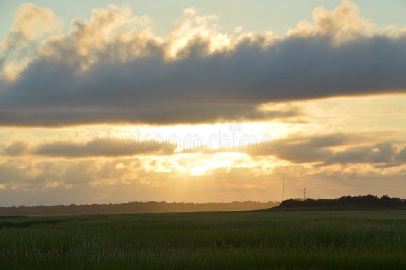 Sunrise over countryside stock image. Image of sunrise - 58671115