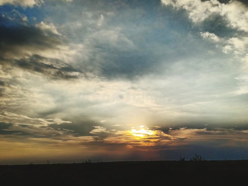 Sunset when the sun said S stock photo. Image of sunset - 210600312
