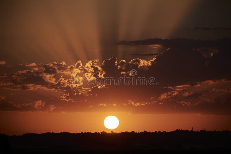 Sunset Sun Setting Behind the Horizon Stock Photo - Image of atmosphere ...
