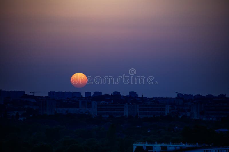 Sunset Sun and Town with Orange Disk Over Paris Suburb Stock Image ...