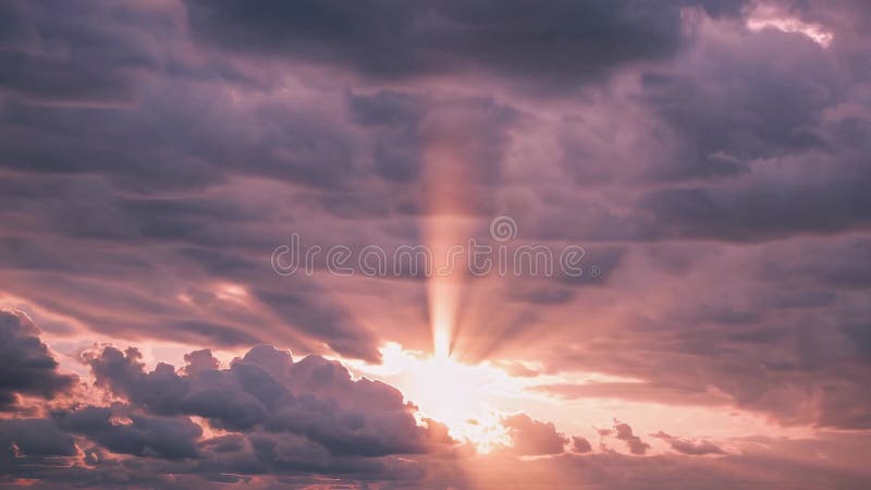 Sunset with Sunbeams Breaking through Clouds in Pink Sky. Serene ...