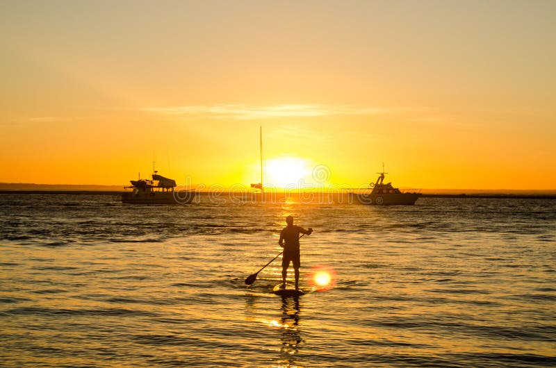 Sunset SUP Australia stock photo. Image of board, blue - 77011954