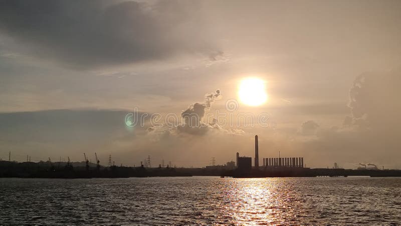 Sunset in Surabaya Port stock image. Image of sunrise - 227163225