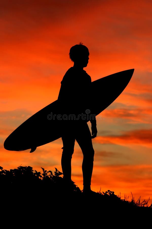Sunset Surfer stock photo. Image of watching, surf, surfer - 2389242