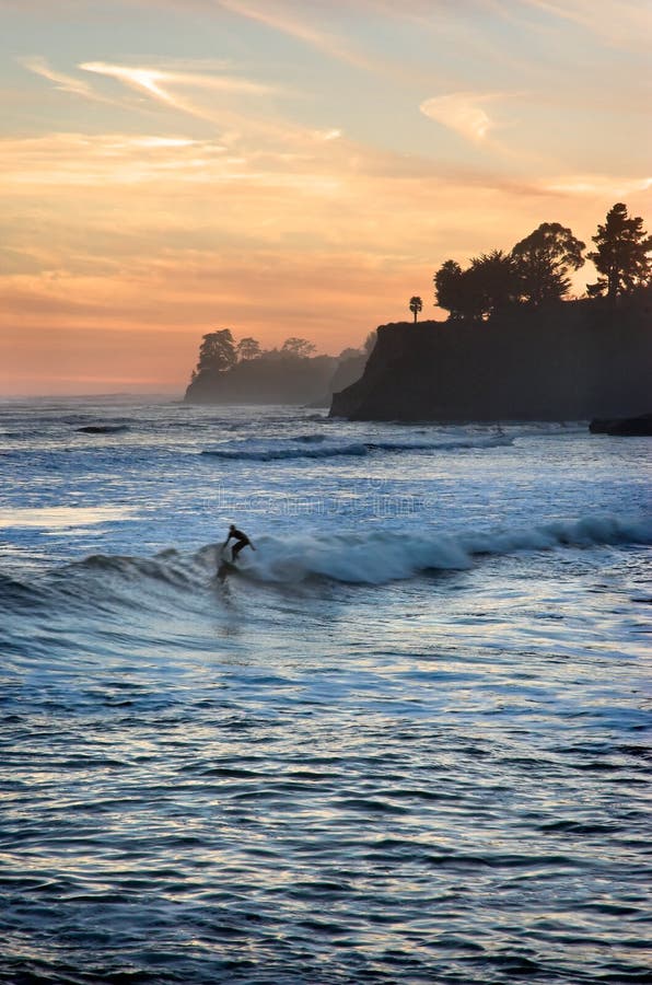 Sunset Surfer stock photo. Image of shore, surfboard, catching - 443038