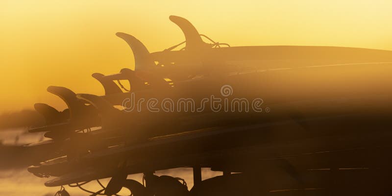 Sunset Surfing Stacked Surfboards Background Stock Photo - Image of ...
