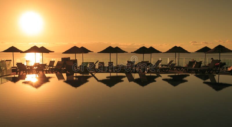 Sunset and swimming pool stock photo. Image of sand, paradise - 4164704