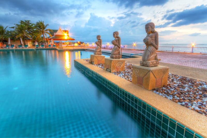 Sunset at swimming pool stock image. Image of leisure - 31658197