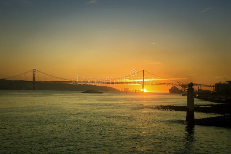 Sunset on Tagus River in Lisbon Stock Photo - Image of bridge, steel ...