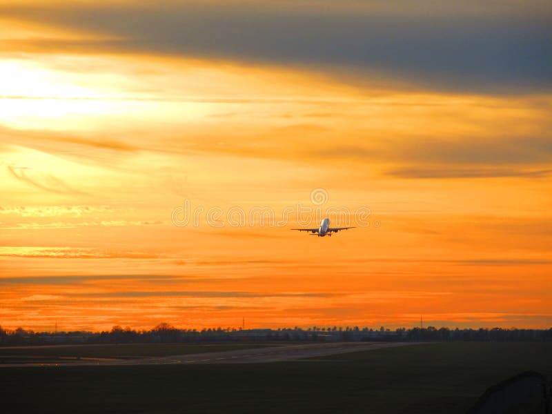 Sunset Takeoff stock photo. Image of airfield, tower - 67954070