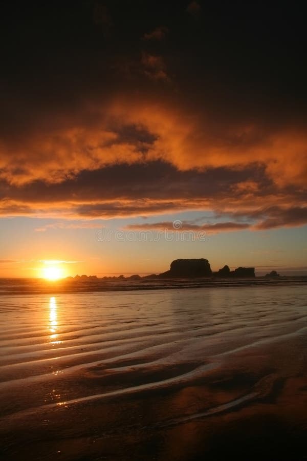 Sunset at Tauranga Bay stock photo. Image of sunset, sandy - 6694858