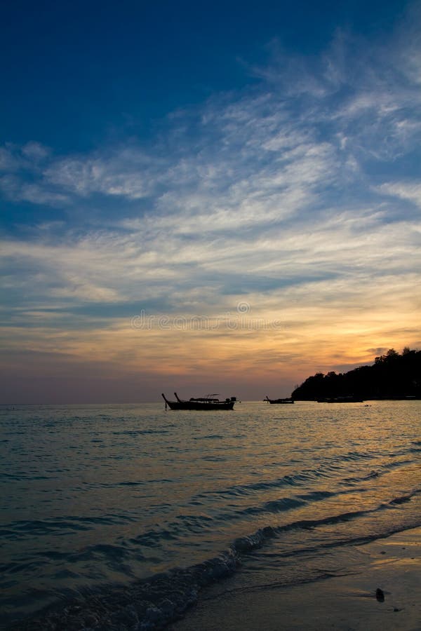 Sunset on a Thai Beach stock photo. Image of boat, tropical - 29293738