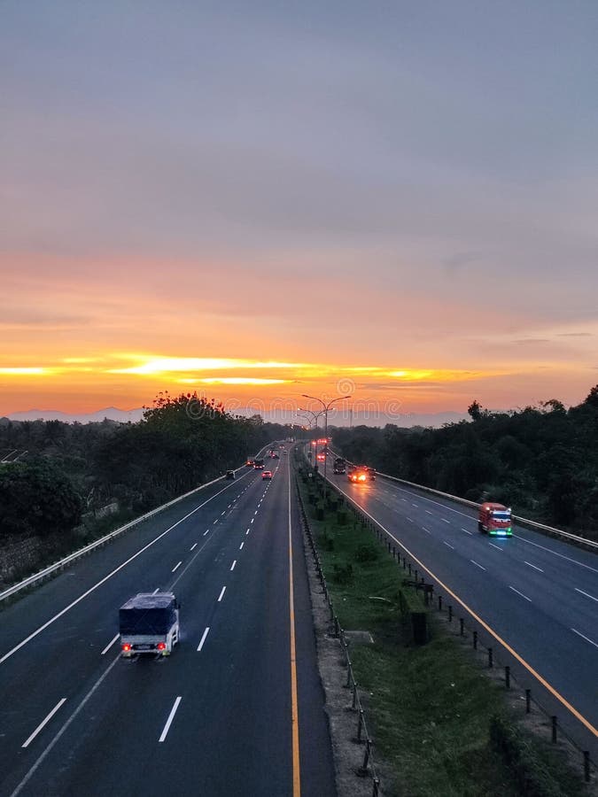 Sunset on the Toll Road, on the Way Home. Stock Image - Image of home ...