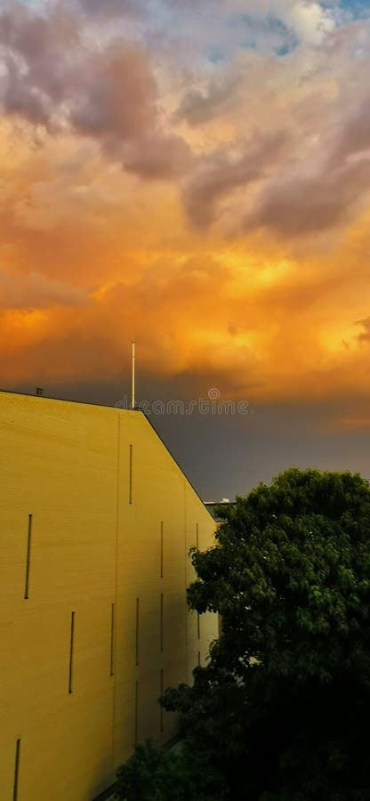Sunset in the town stock photo. Image of yellow, blue - 157529666