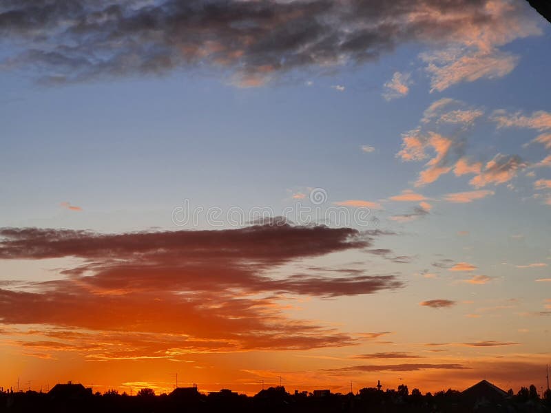 Sunset in Town with Orange Sky Piramide Stock Photo - Image of horizon ...