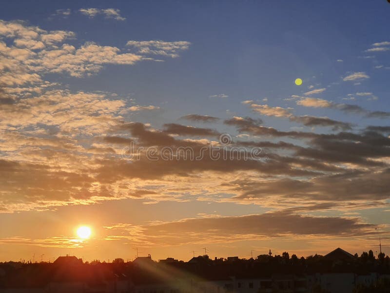 Sunset in Town with Orange Sky Piramide Stock Photo - Image of ...