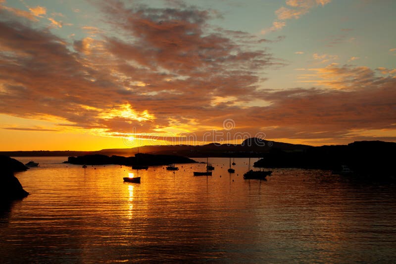 Sunset at Trearddur Bay stock photo. Image of boats, wale - 25825116