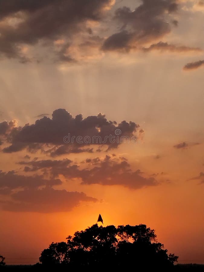 Sunset on Tree,Temple Flag ,India Temple Sunset, Religion Stock Photo ...