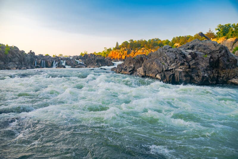 Sunset on a Turbulent Mountain River with Waterfalls and Rapids Stock ...