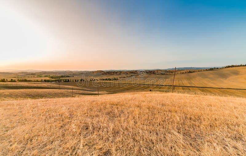 Sunset on Tuscan fields stock image. Image of tuscan - 99124039
