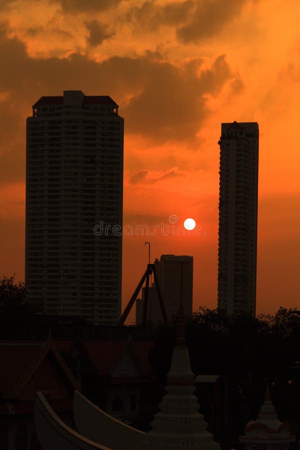 Sunset between Twin Building Stock Image - Image of silhouette, sunset ...