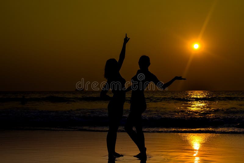 Sunset with models stock photo. Image of holding, happy - 62680216