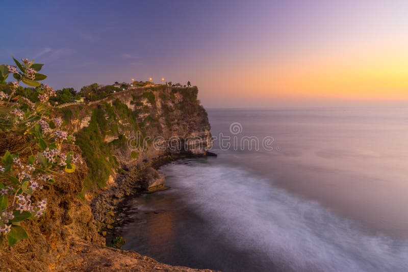 Sunset at Uluwatu temple stock photo. Image of stone - 45418592
