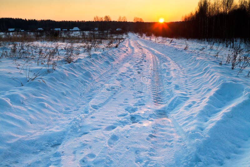 Sunset Under Snow Country Road Stock Photo - Image of blue, horizon ...