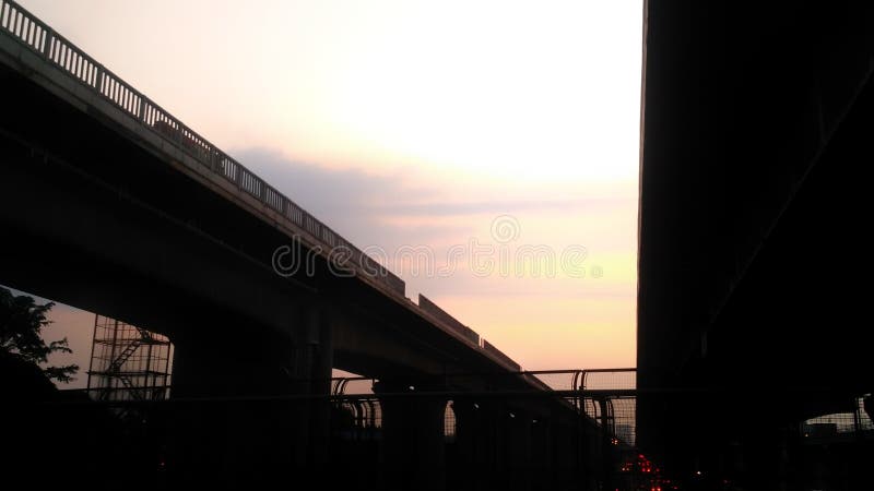 Sunset from Under the Train Bridge Stock Photo - Image of landscape ...